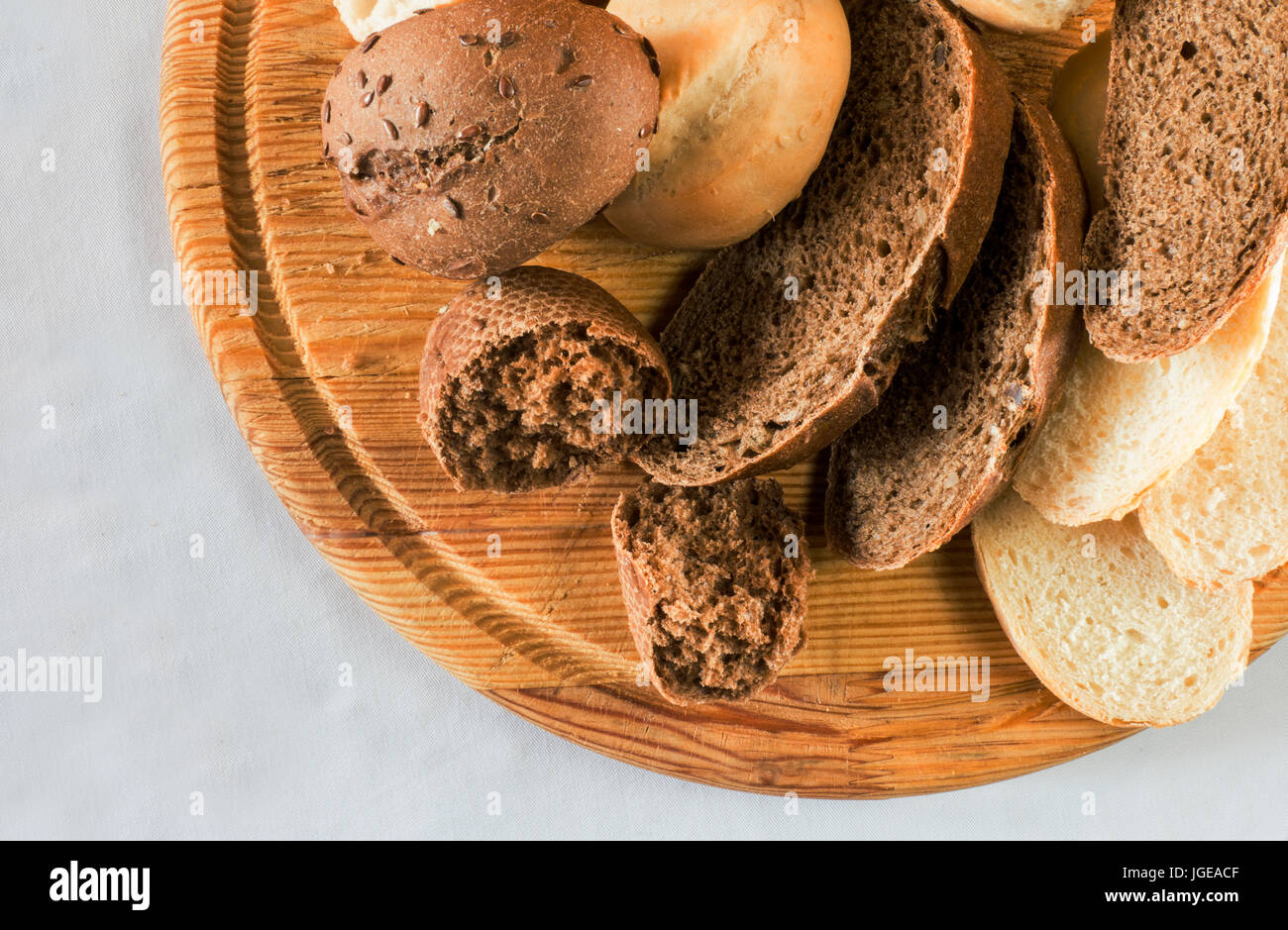 Various kinds of bread for dinner Stock Photo - Alamy