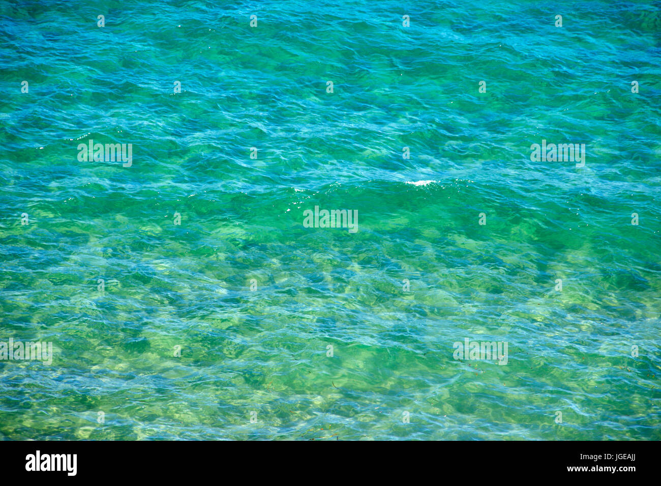 Texture of turquoise sea water background Stock Photo - Alamy