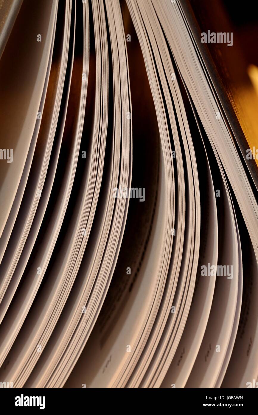 Closeup of pages of an open book Stock Photo - Alamy