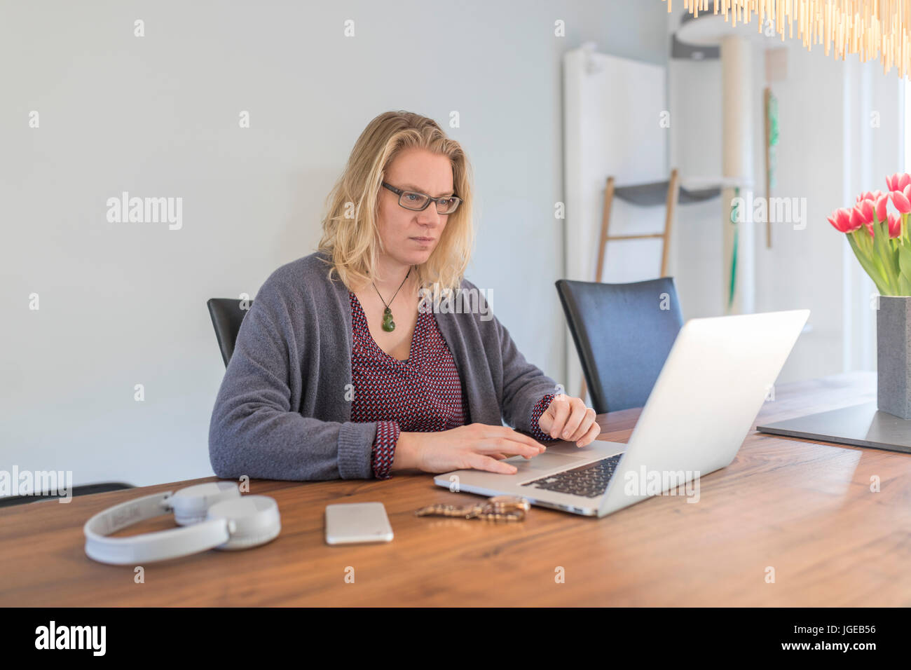 Working at the dining table hi-res stock photography and images - Alamy