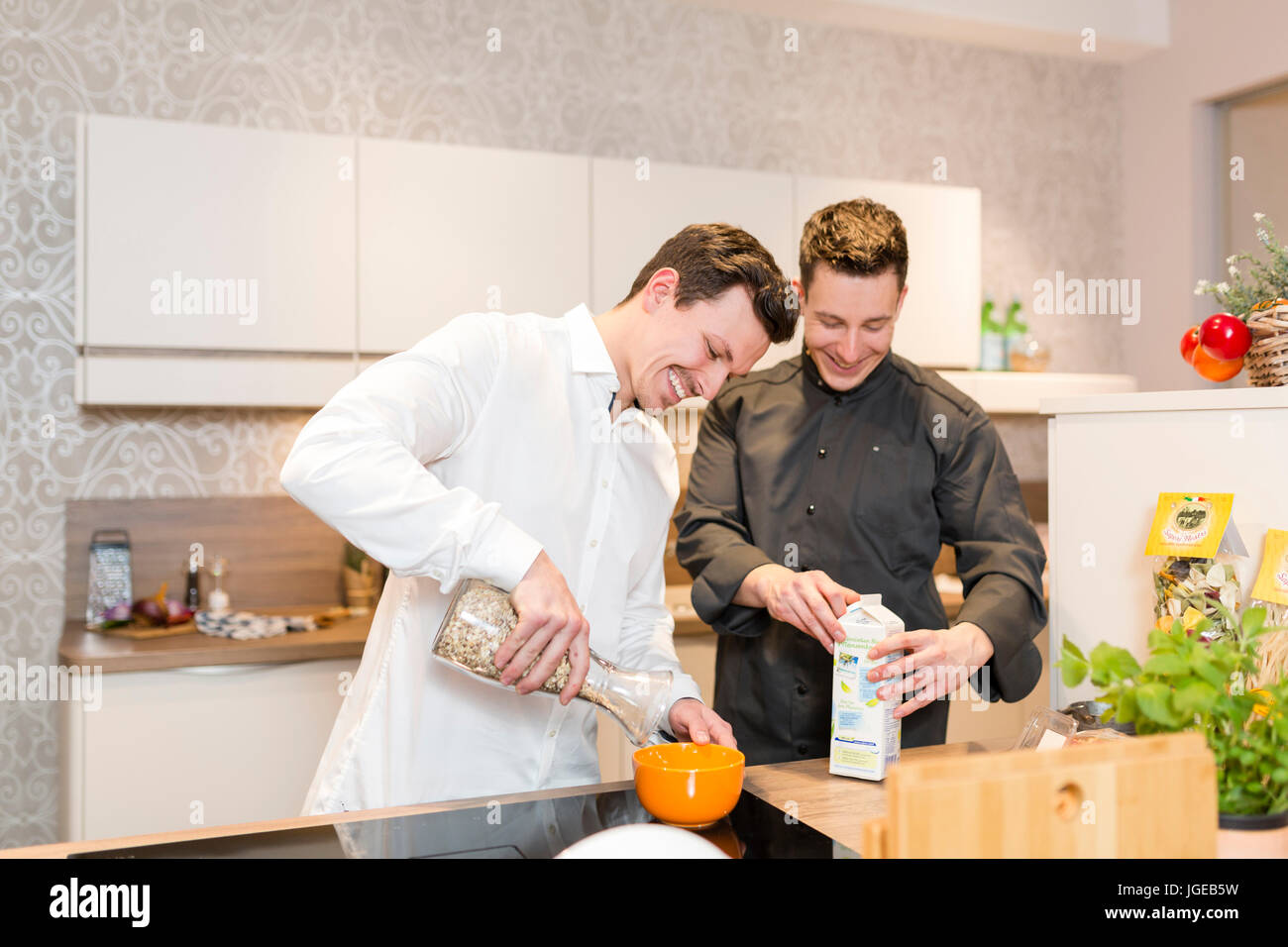 Cook gives a cooking course Stock Photo - Alamy