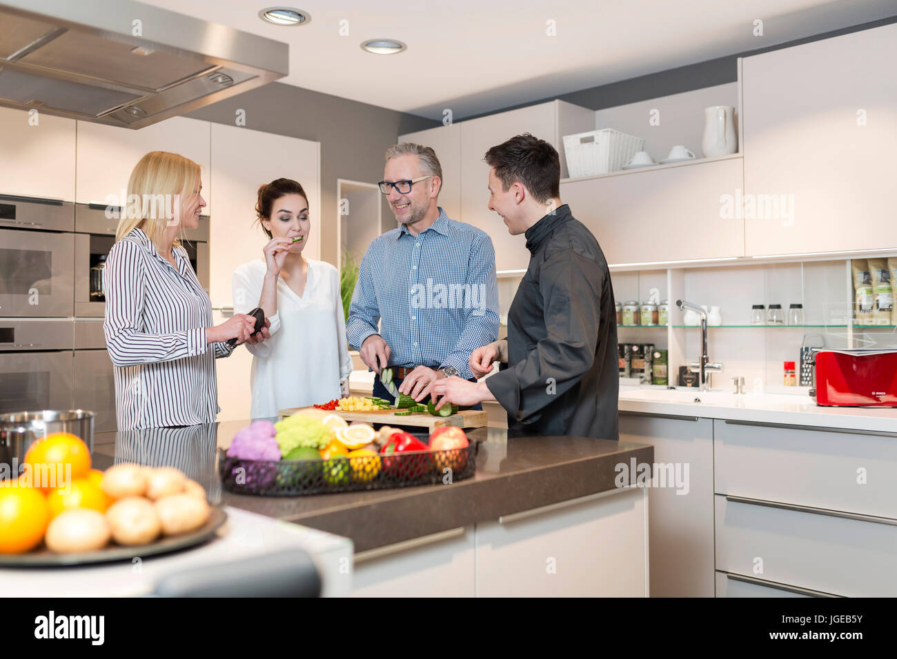 Cook gives a cooking course Stock Photo - Alamy