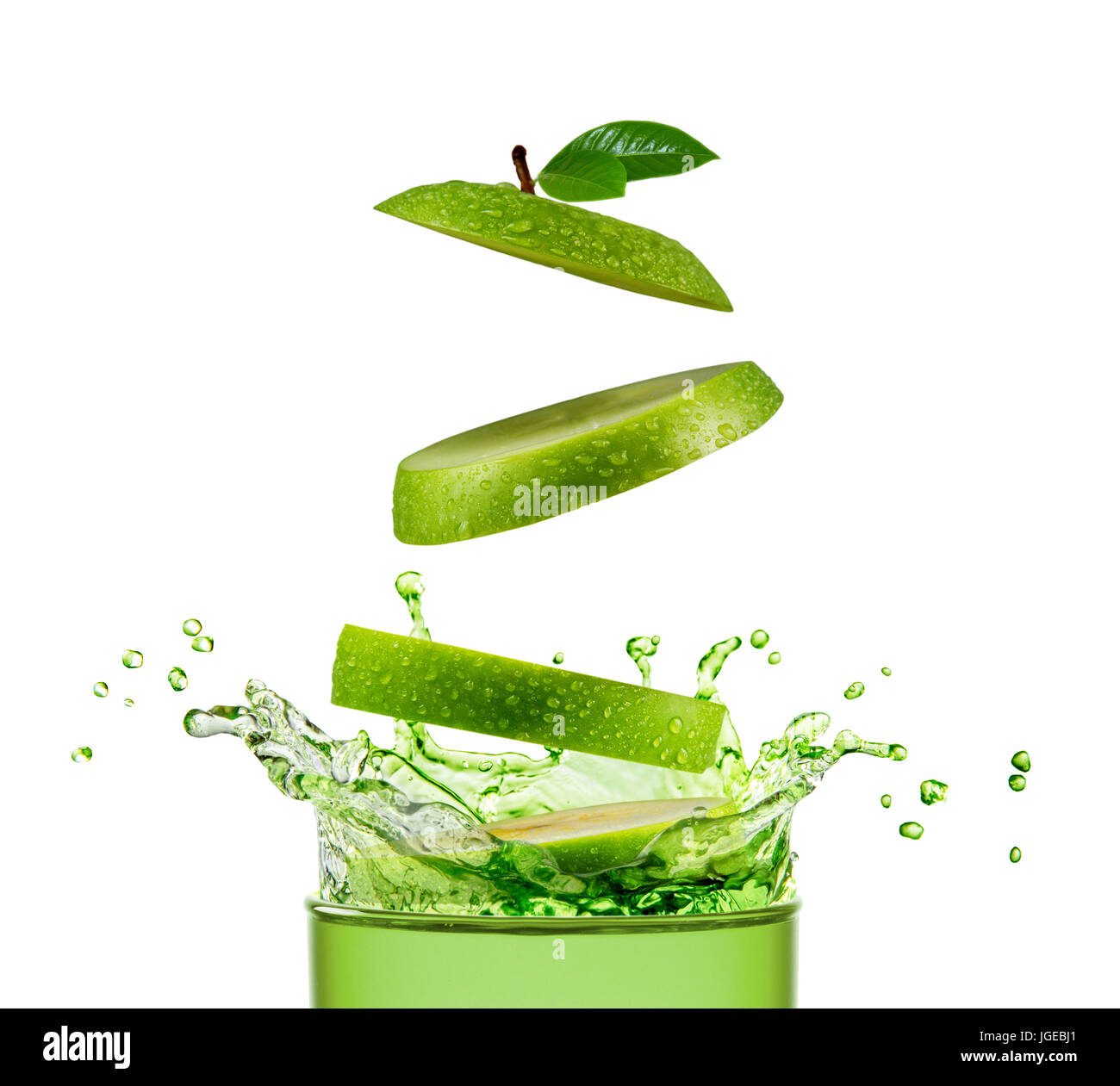 green apple with juice splash Stock Photo - Alamy
