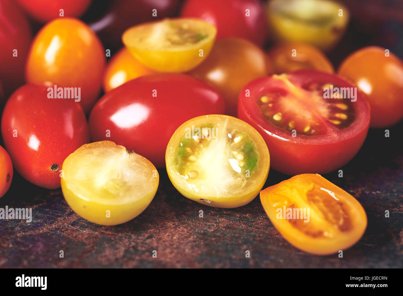 Sweet summer and multi colored tomatoes Stock Photo - Alamy