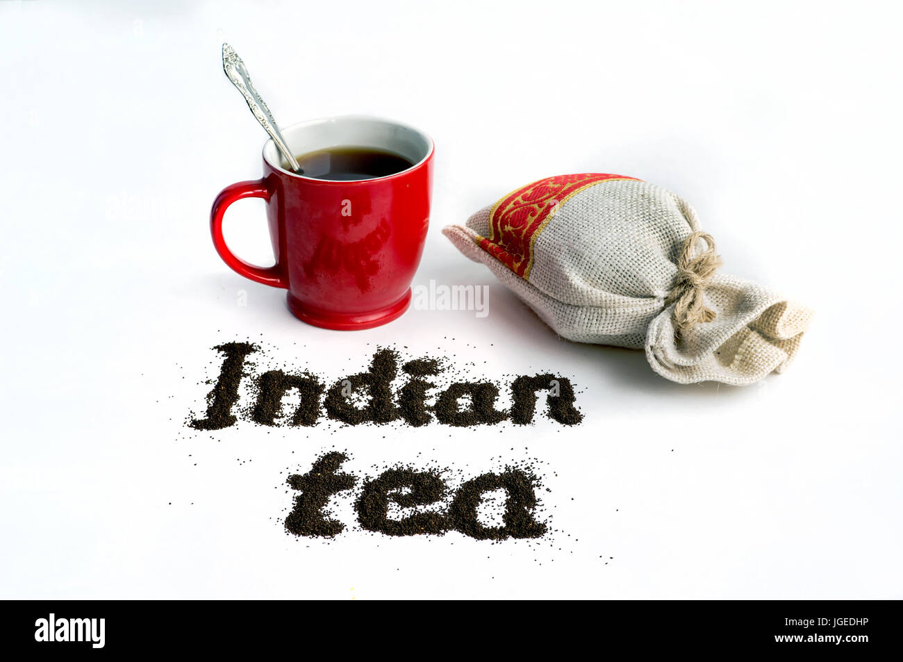 inscription Indian tea on a isolated white background next to the mug ...