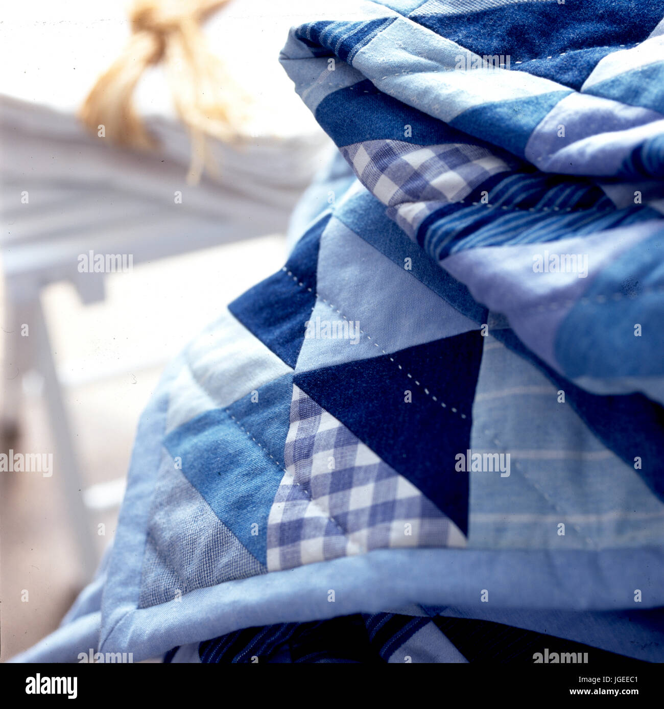 Close-up of blue patchwork quilt Stock Photo - Alamy