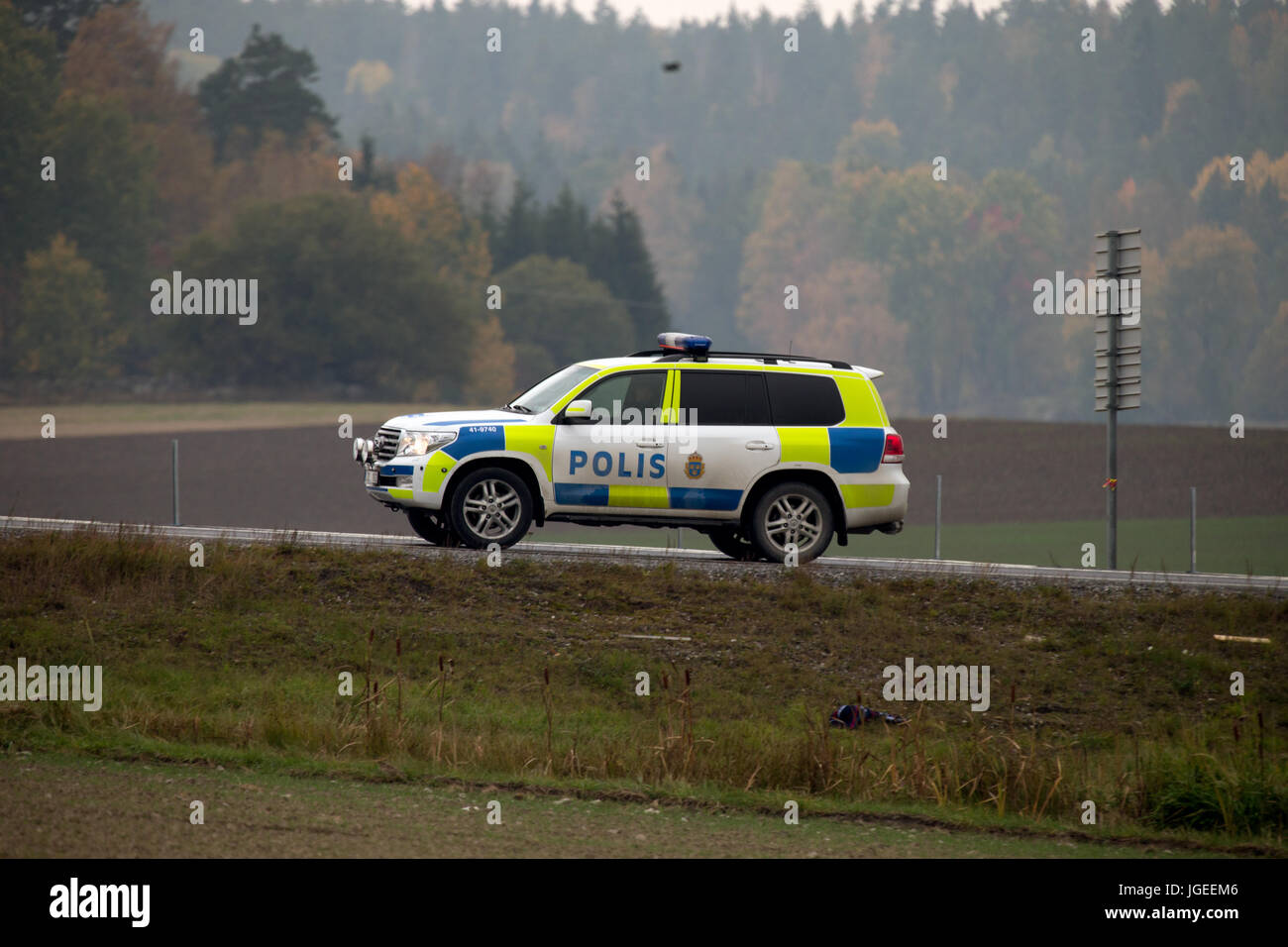 Police SUV on a rural highway Stock Photo - Alamy
