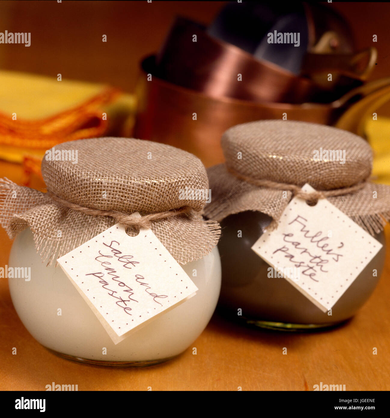 Fullers earth and salt & lemon paste in jars with hessian covers Stock ...