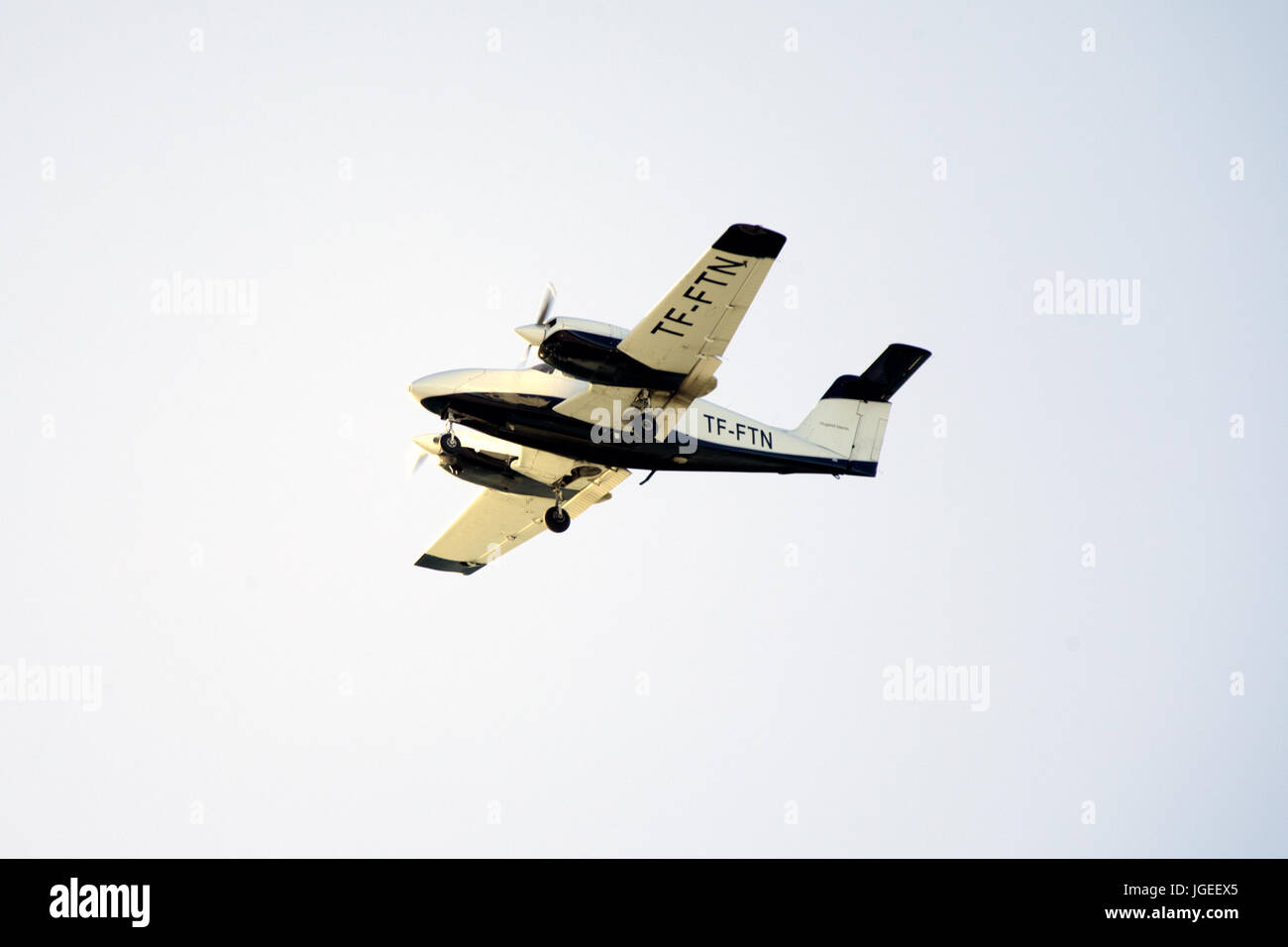 Propeller airplane over Reykjavik Stock Photo - Alamy