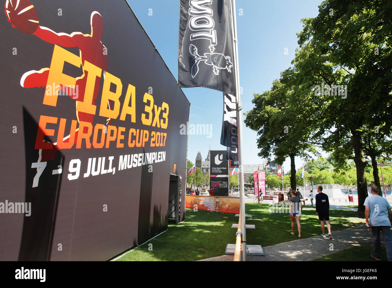 People walk past installation of the sporting arena to FIBA 3X3 Europe ...