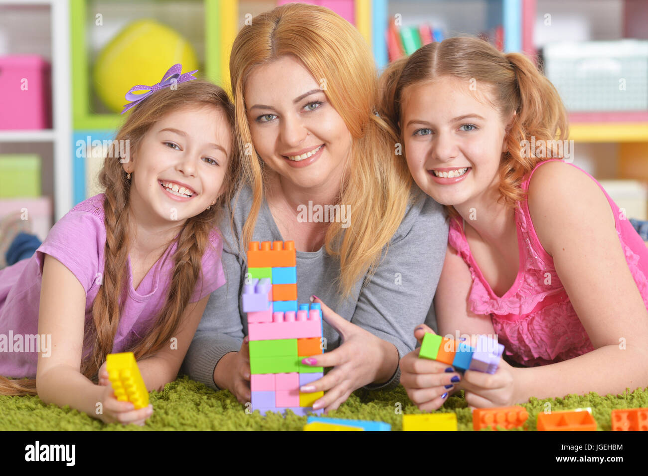 family playing with blocks together Stock Photo - Alamy