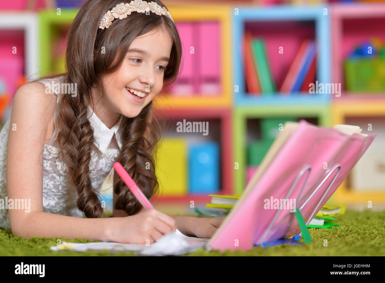 cute girl doing homework Stock Photo - Alamy
