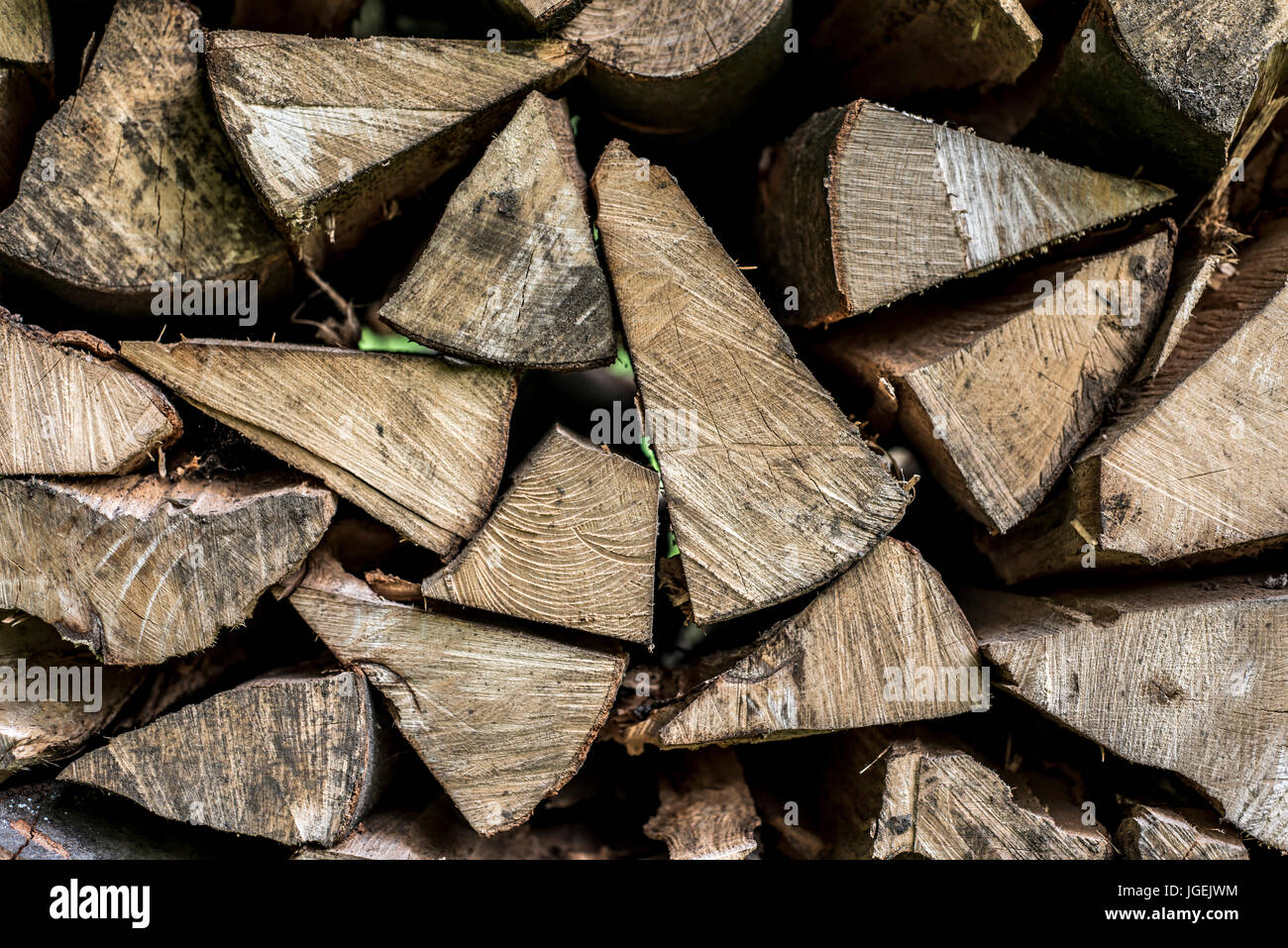 Abstract photo of a pile of natural wooden logs background dry chopped ...