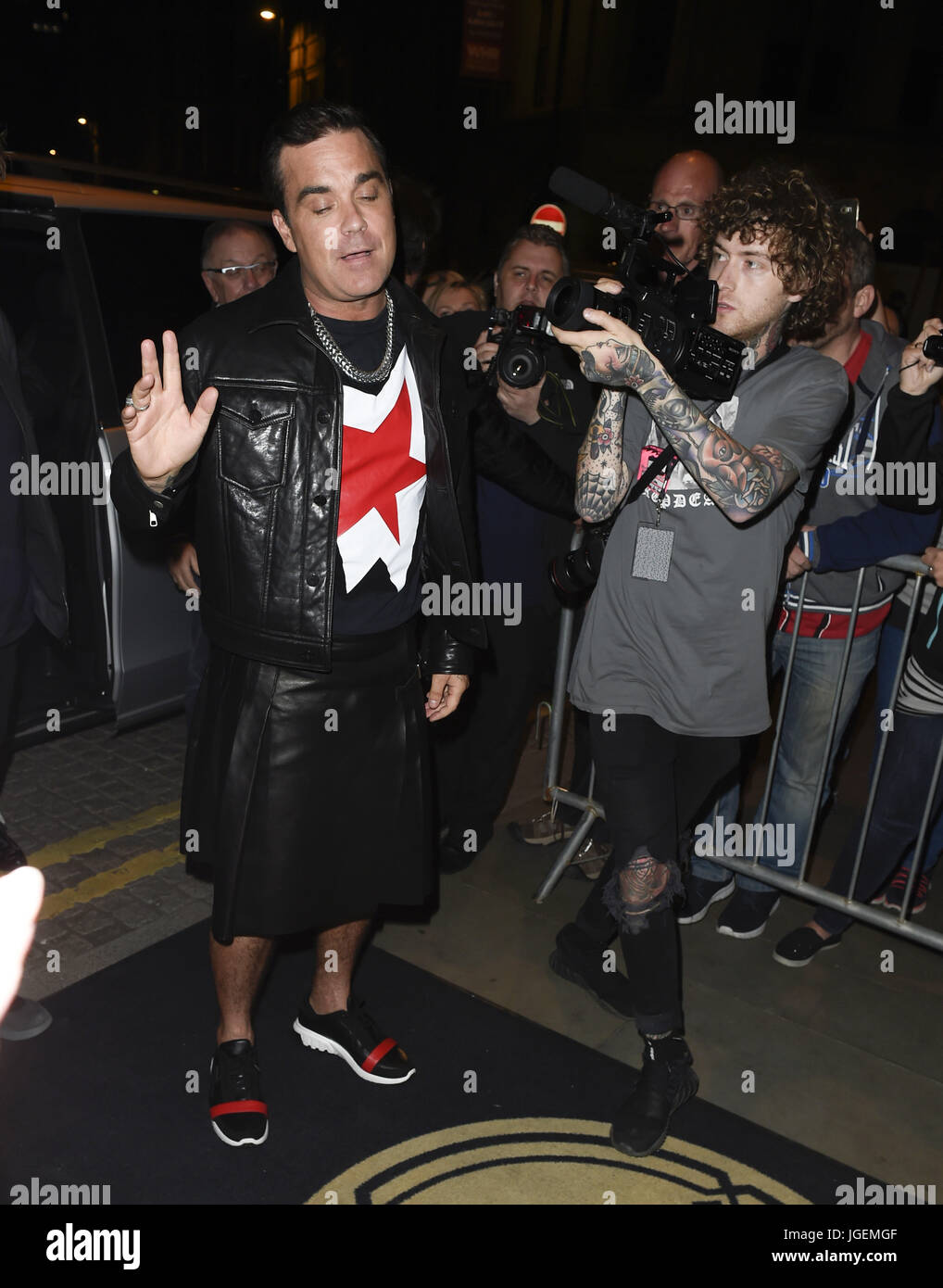 Robbie Williams seen arriving back at his hotel in Manchester Featuring ...