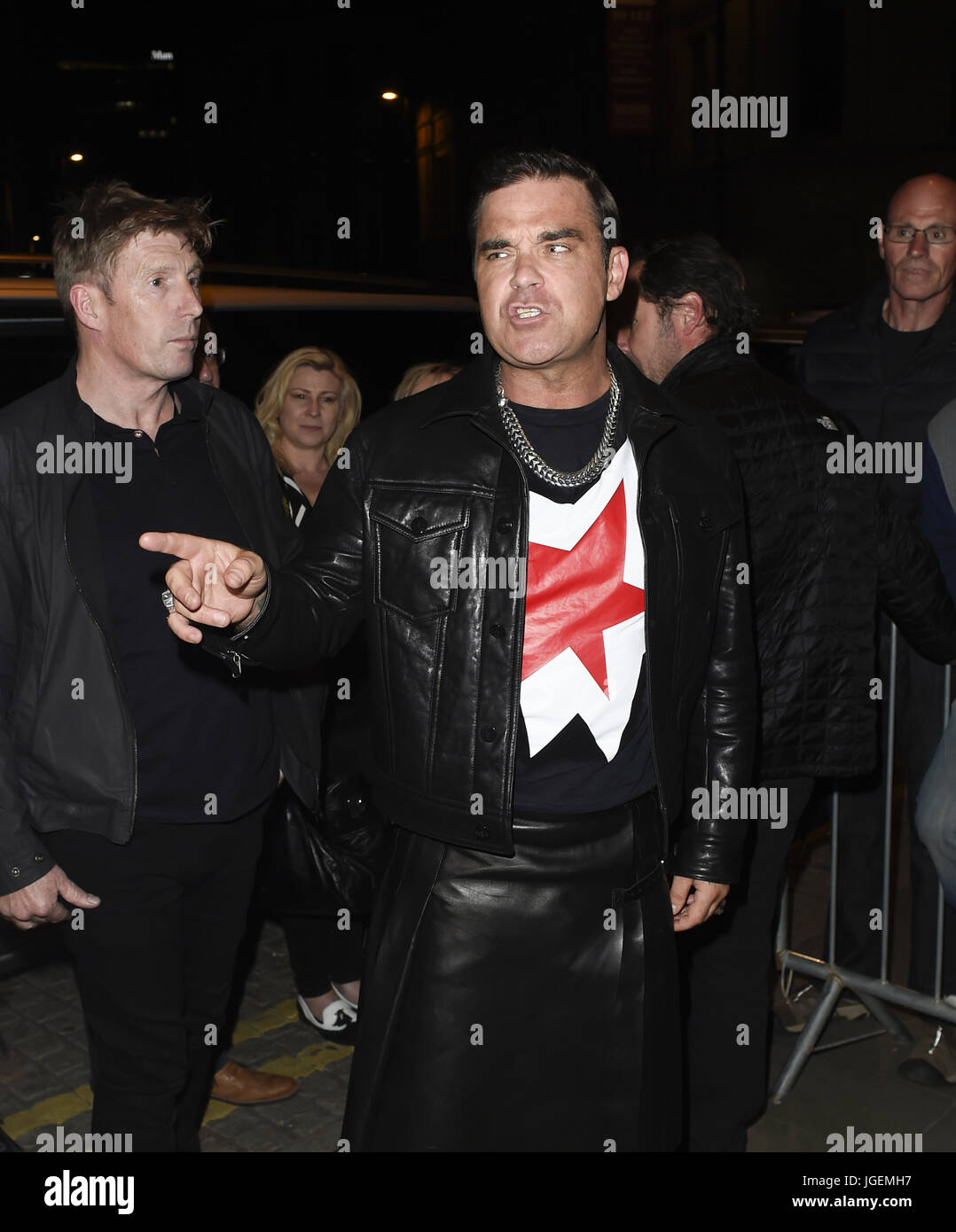 Robbie Williams seen arriving back at his hotel in Manchester Featuring ...