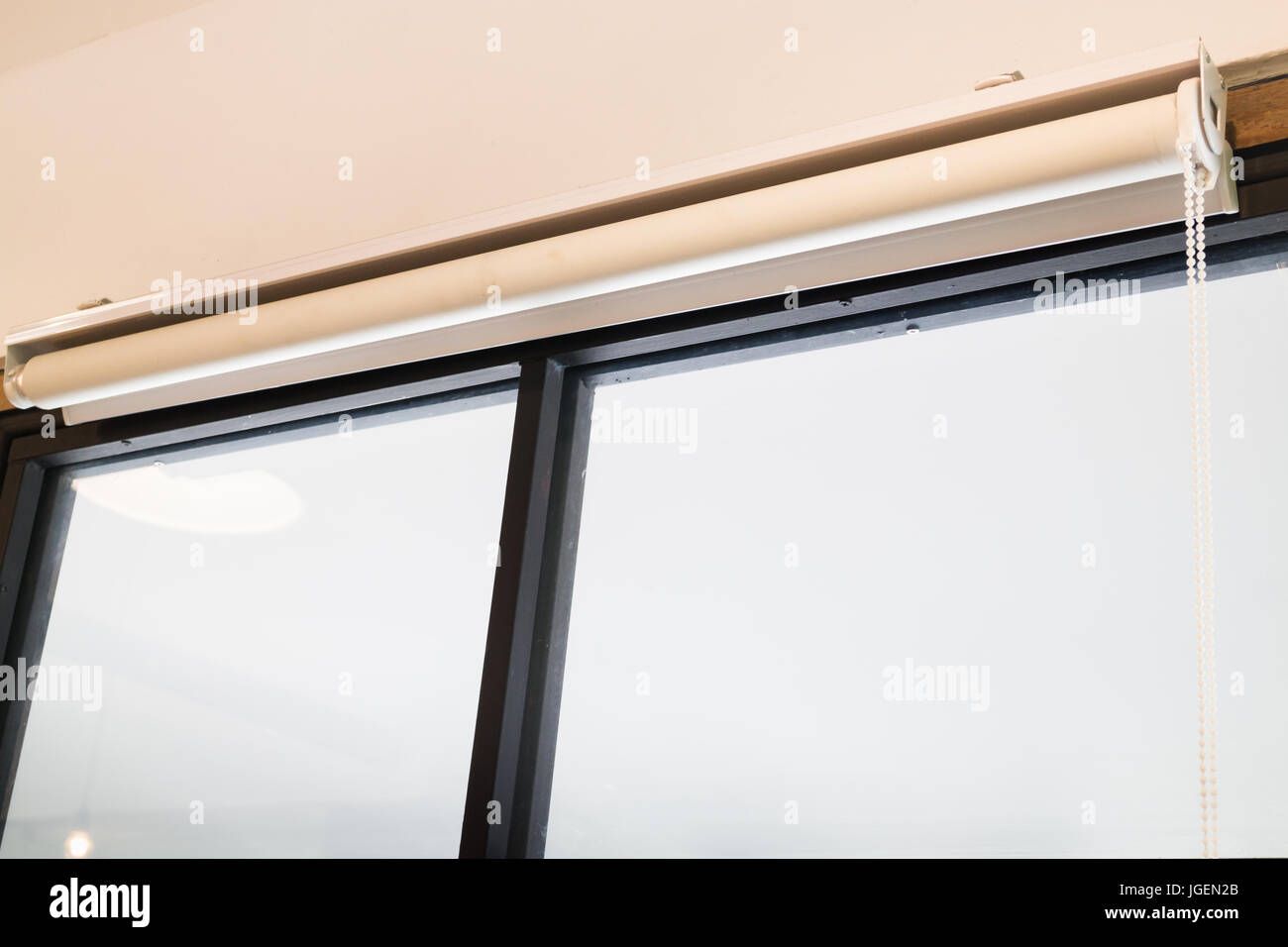Textile roll curtain window blind, stock photo Stock Photo - Alamy