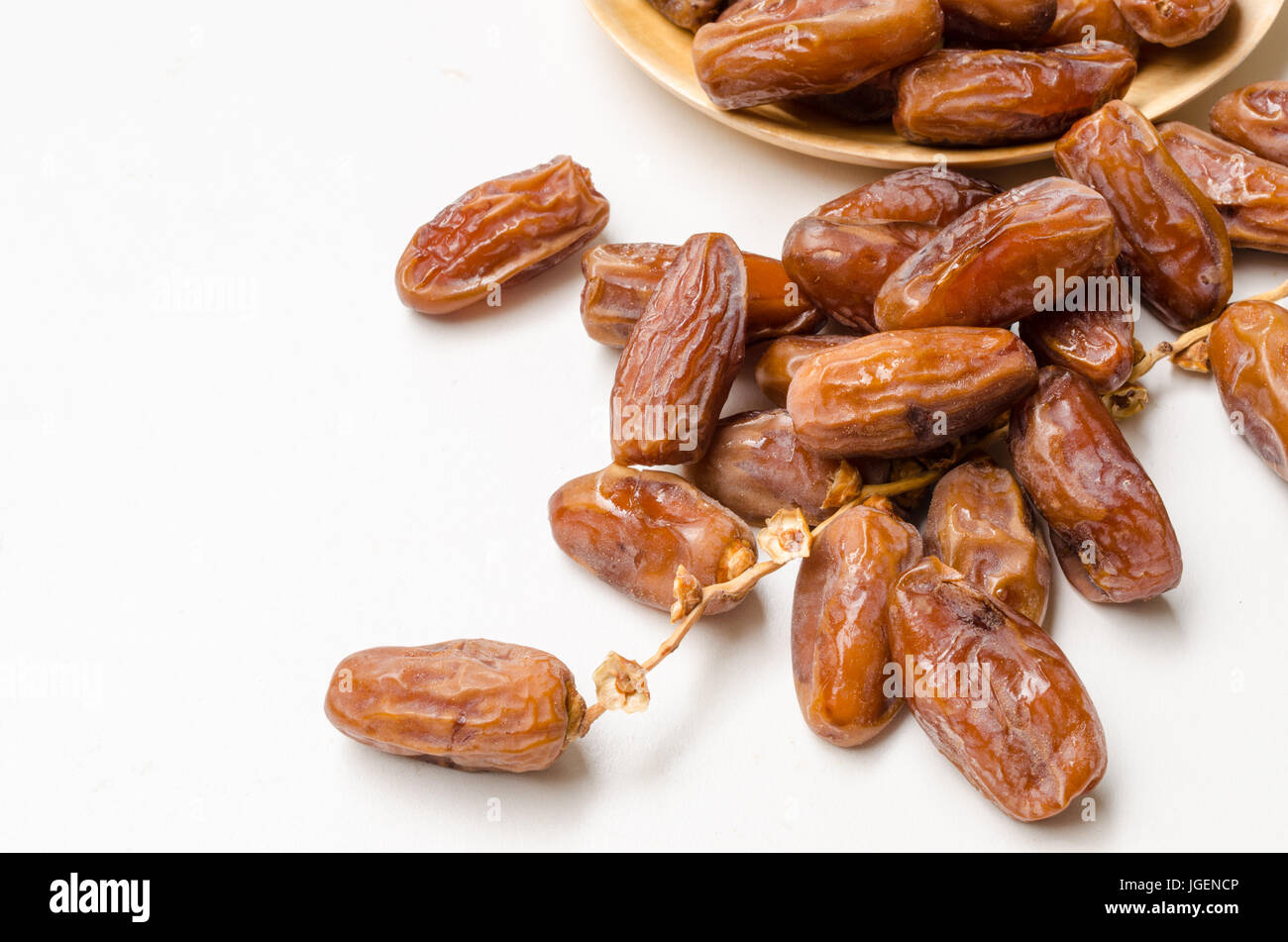 Date palm fruits on wood hi-res stock photography and images - Alamy