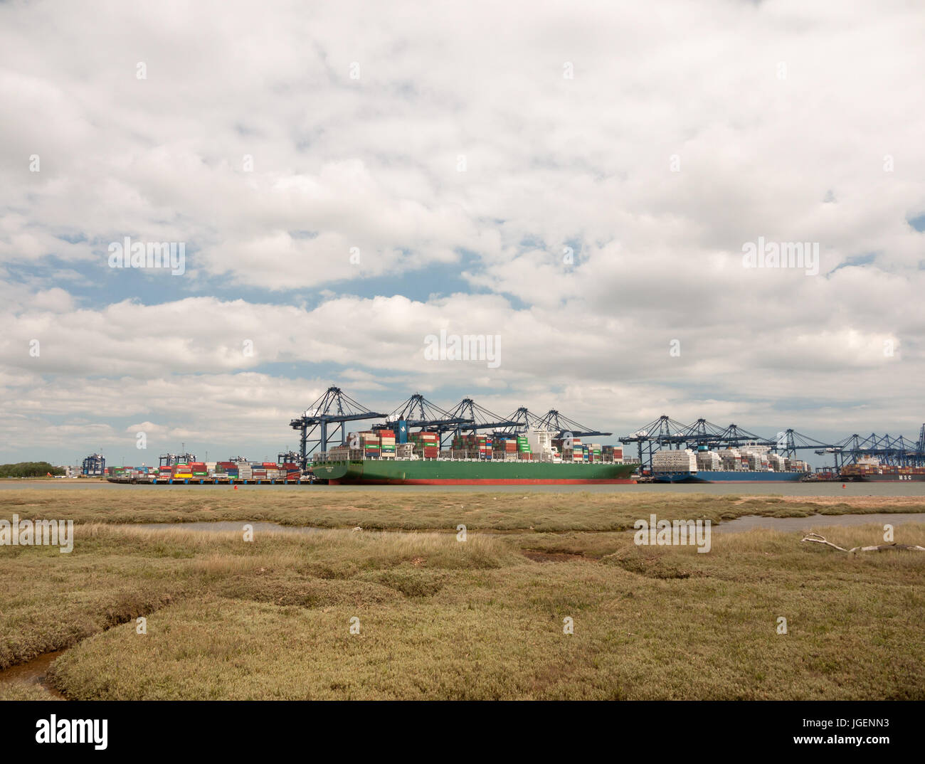 blue sea structure cranes at cargo dock loading in distance felixstowe ...