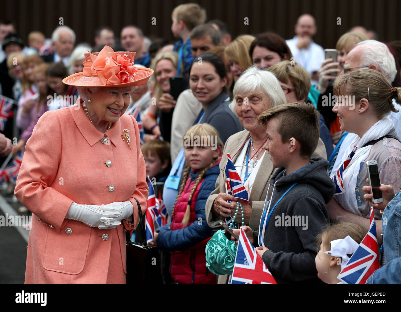 Queen Elizabeth II greets members of the public as she visits the new ...