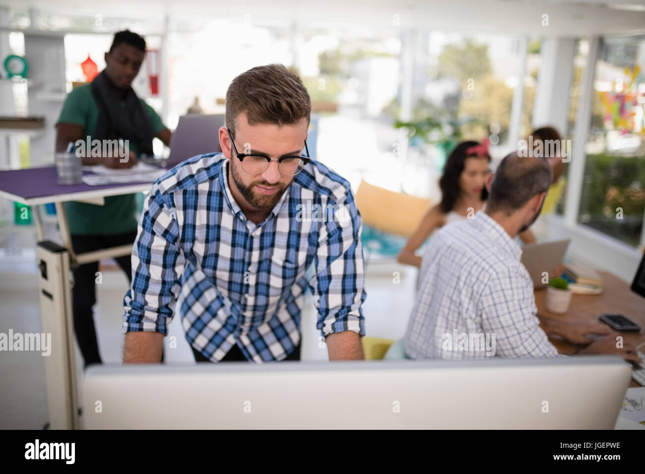 Attentive executive working personal hi-res stock photography and ...