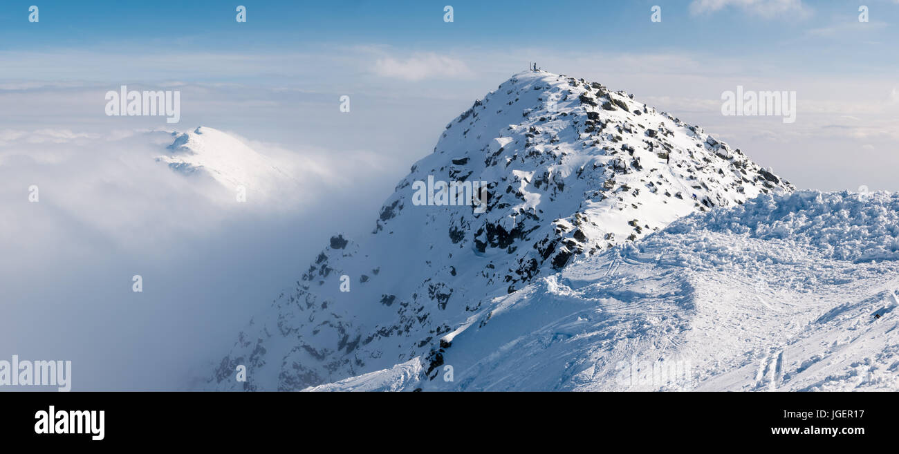 Chopok peak on snowy winter time, above the clouds Stock Photo - Alamy