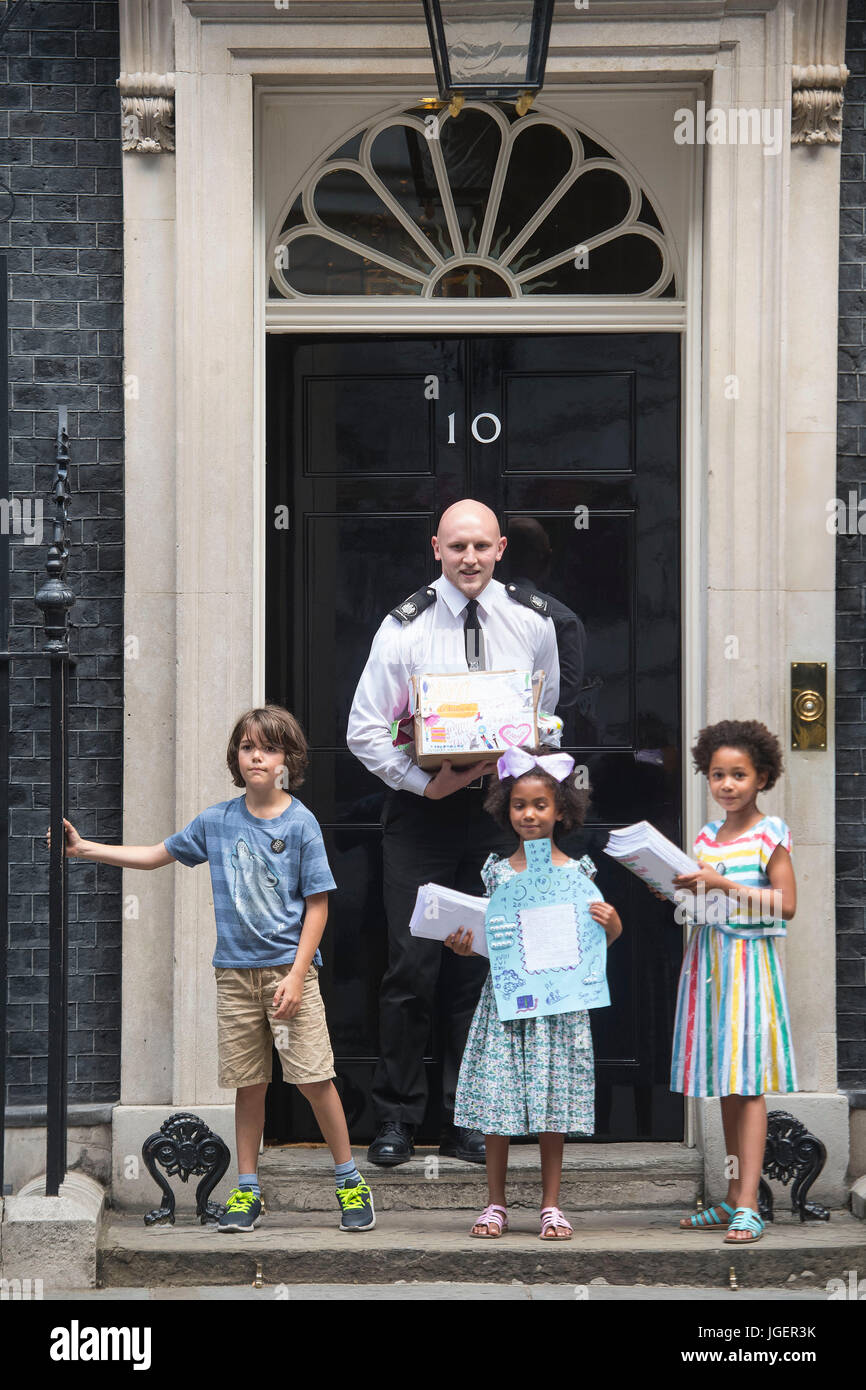 (Left-right) Johnny Miller-Cole, Suzie Ali and Leonie Ali, deliver tens ...