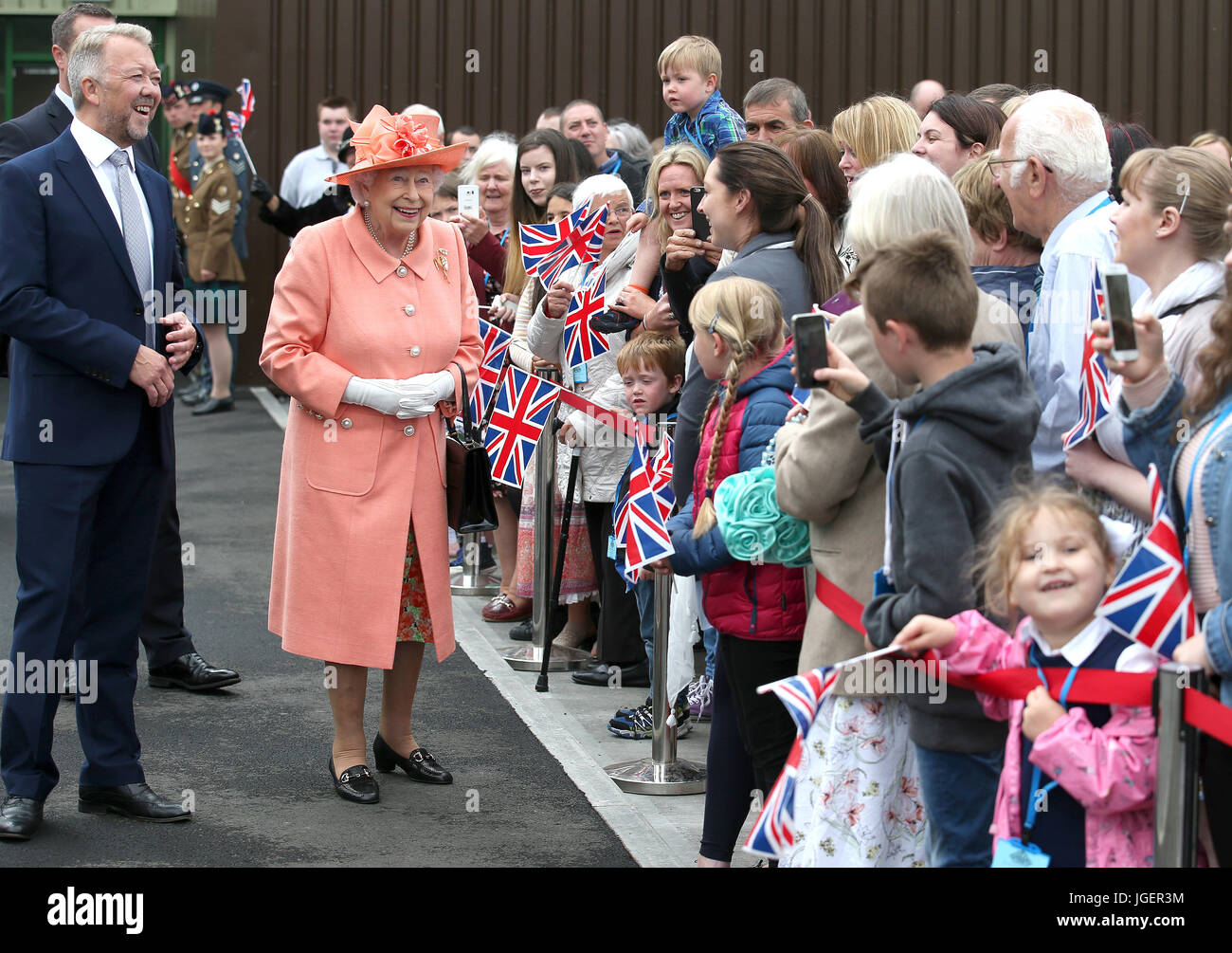 Queen Elizabeth II with Highland Spring chief executive Les Montgomery ...