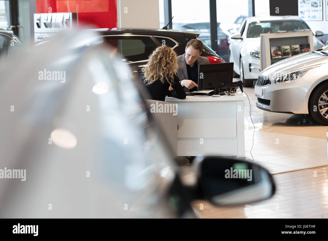 Salesperson and customer computer hi-res stock photography and images ...