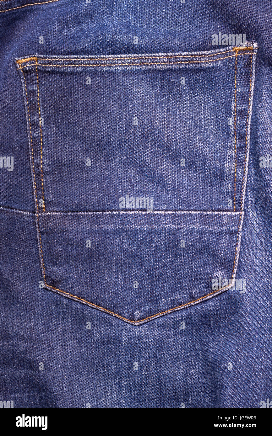 One Blue jeans back pocket as a close up Stock Photo - Alamy