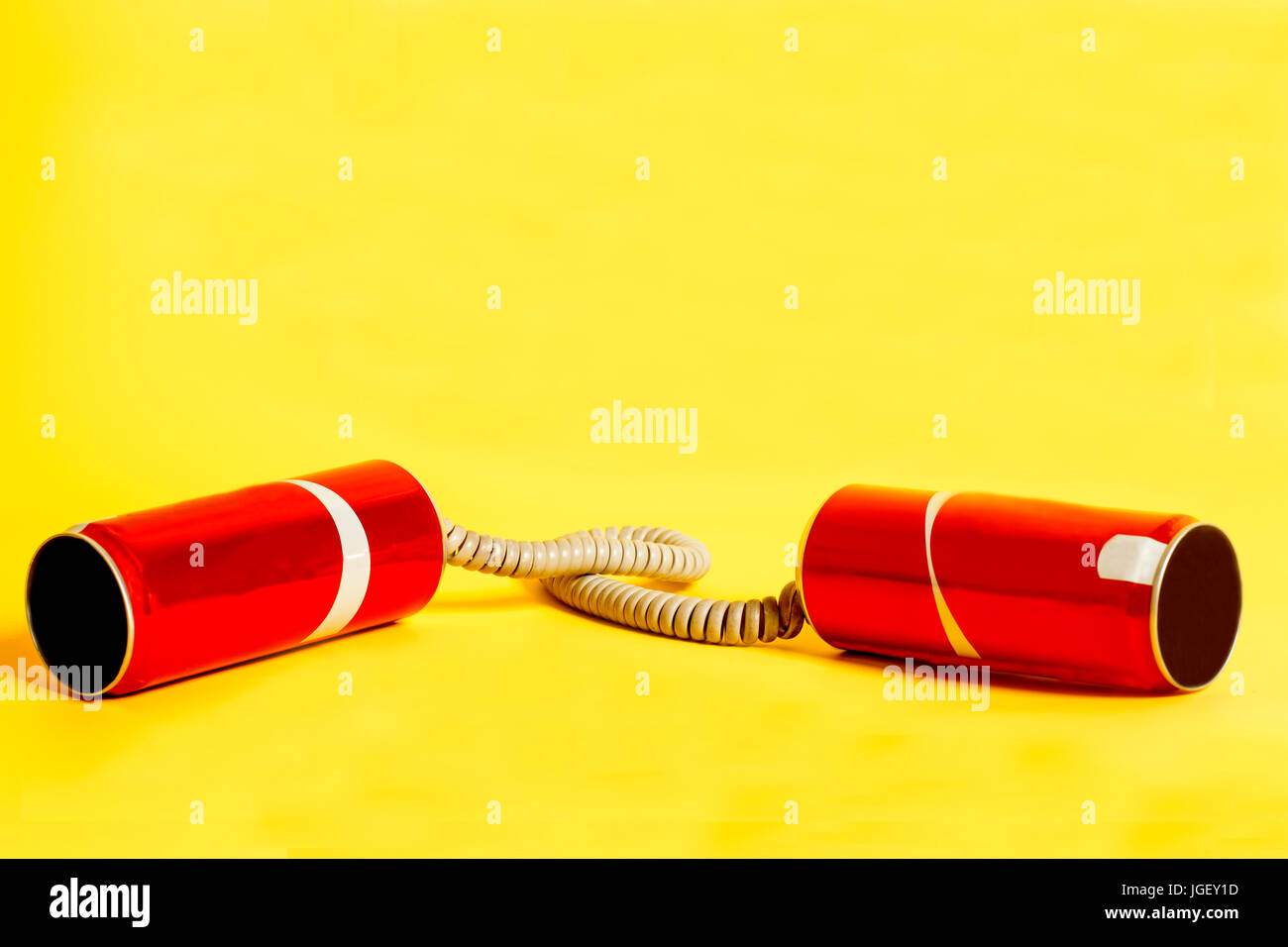 Tin can phone. Communication concept Stock Photo - Alamy