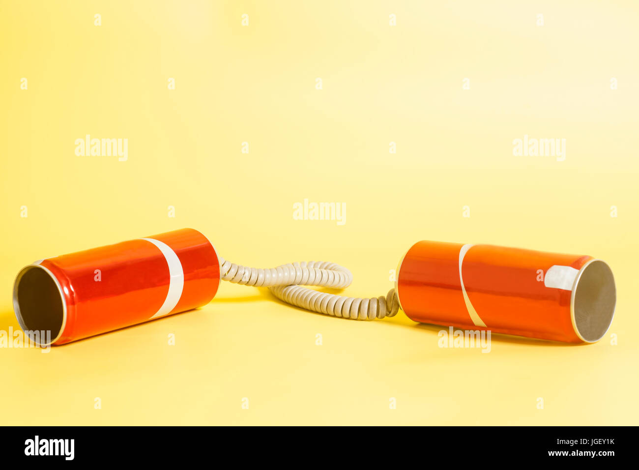 Tin can phone. Communication concept Stock Photo - Alamy