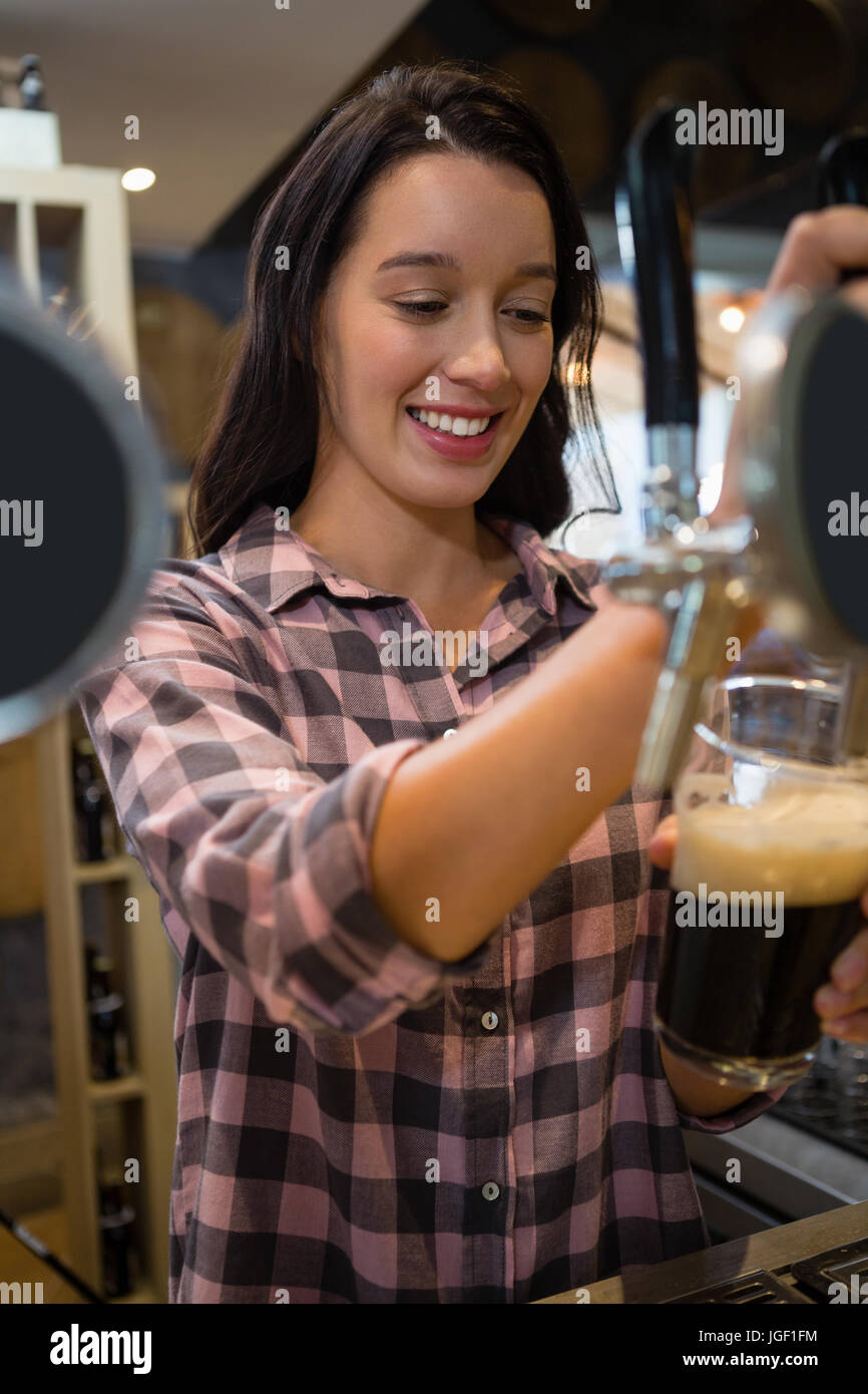 Beautiful barmaid pouring beer in hi-res stock photography and images ...