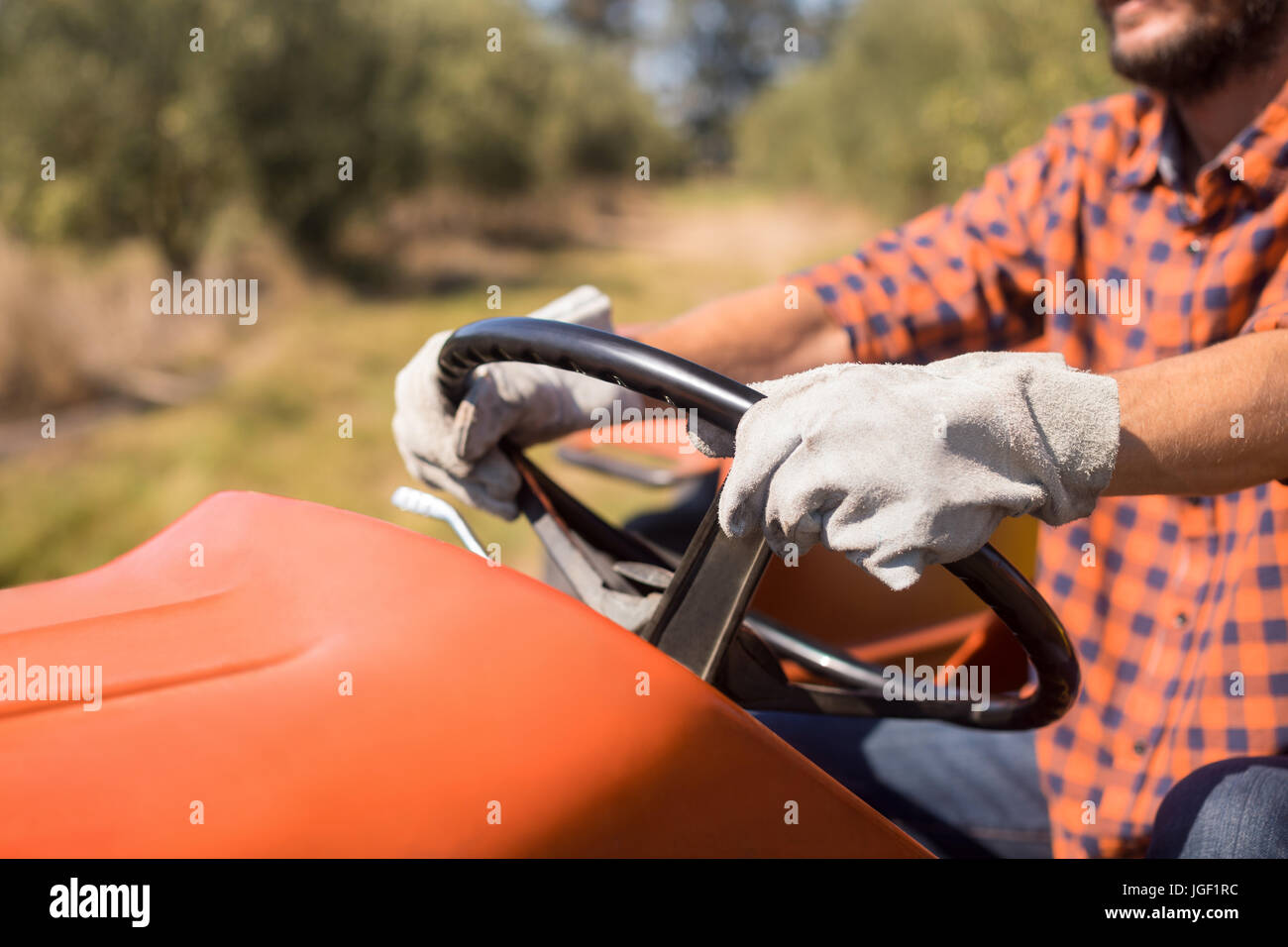 Man driving tractor hi-res stock photography and images - Alamy