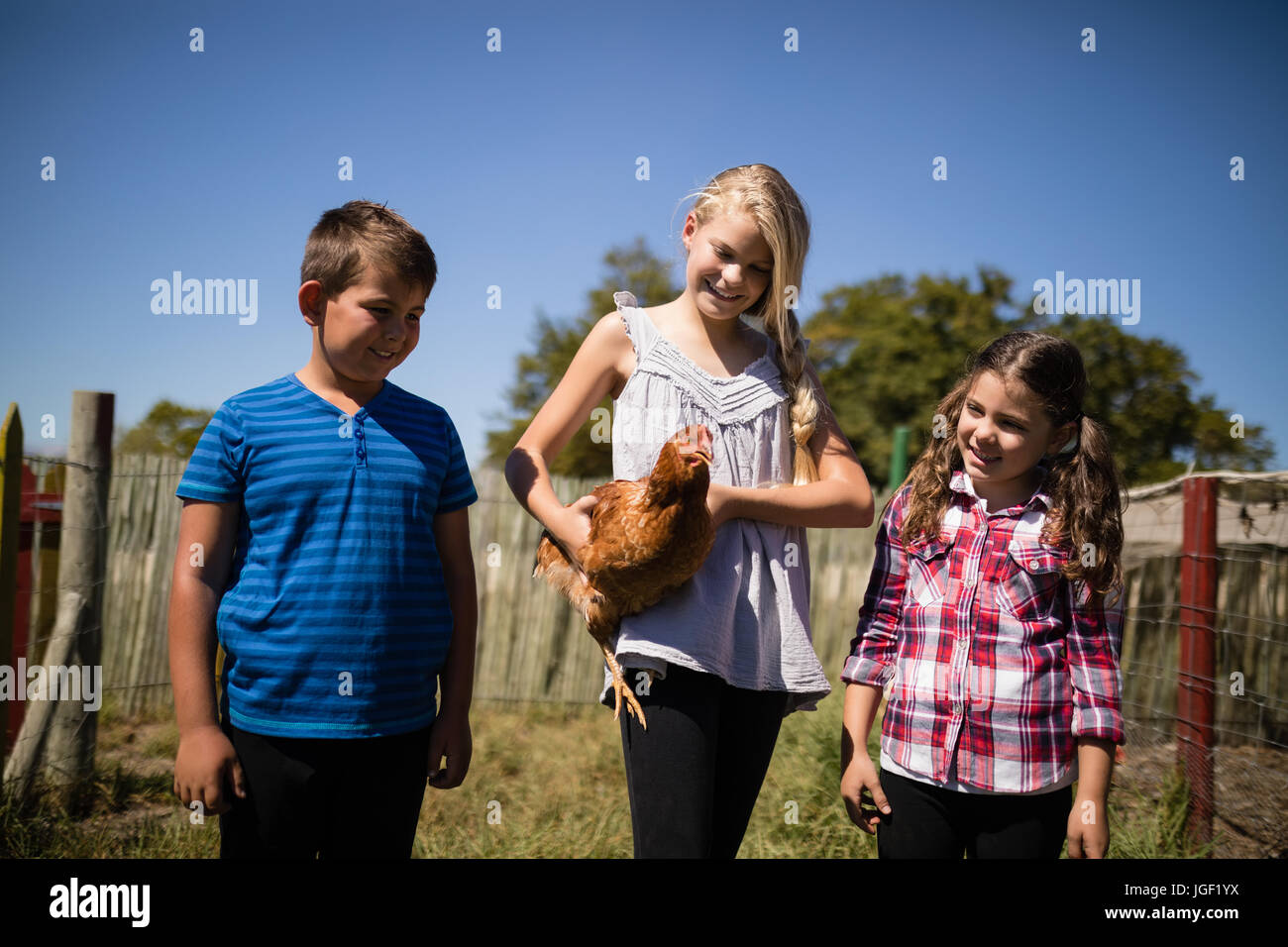 Girl carrying hen hi-res stock photography and images - Alamy