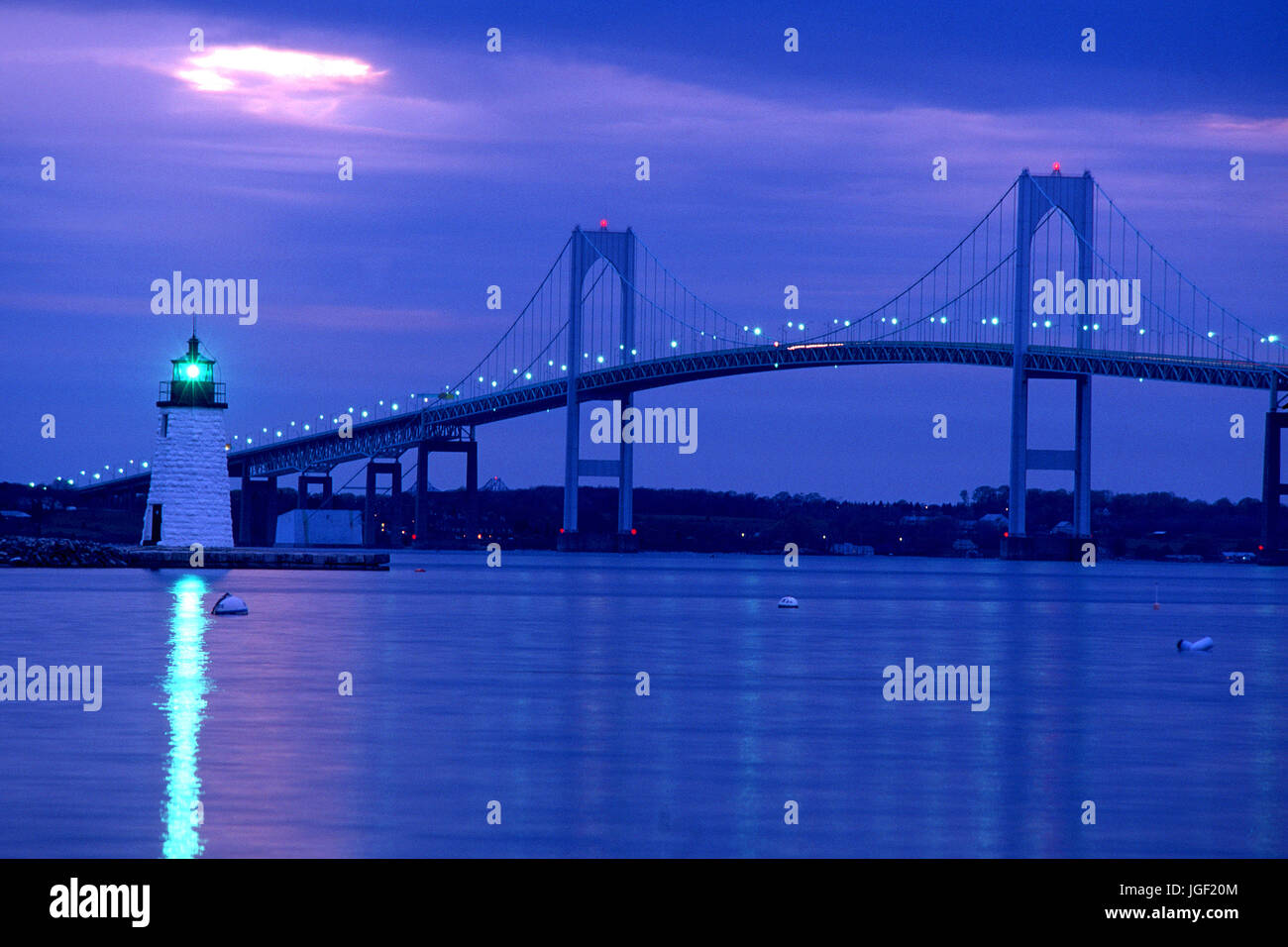 Goat Island Light and the Pell Bridge at night. Newport, Rhode Island ...