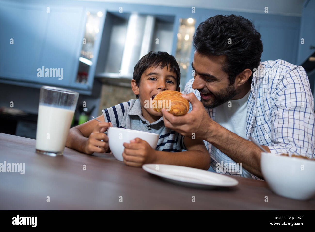 Indian man eating breakfast hi-res stock photography and images - Alamy