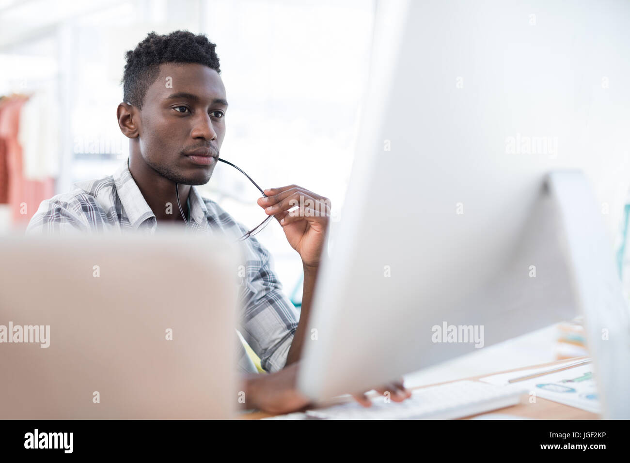 Attentive executive using desktop hi-res stock photography and images ...