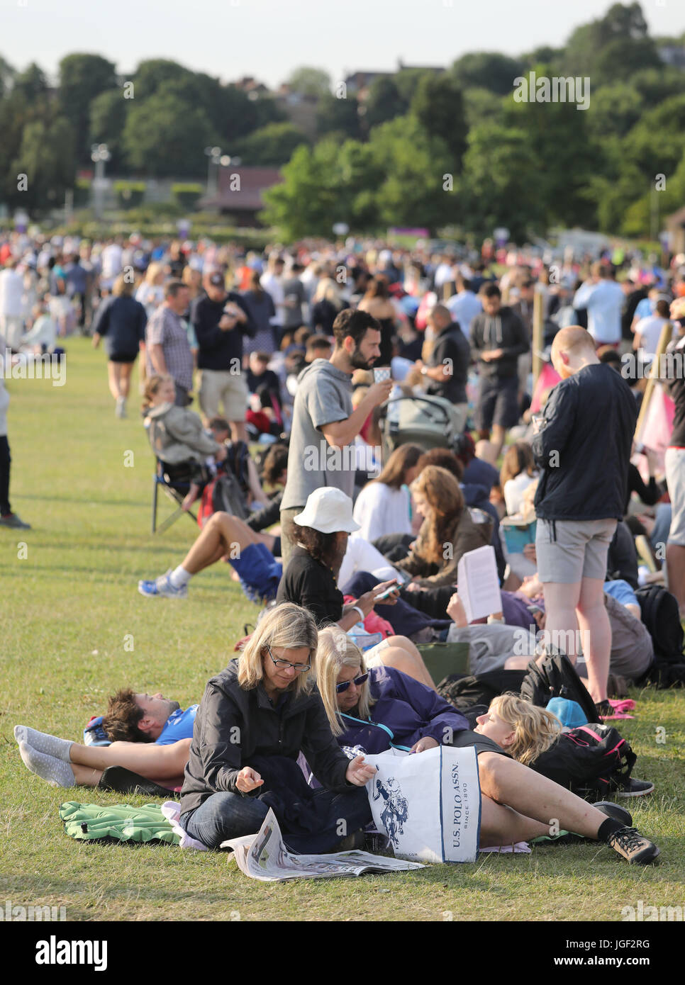 People waiting in the Wimbledon Park queue during day four of the ...
