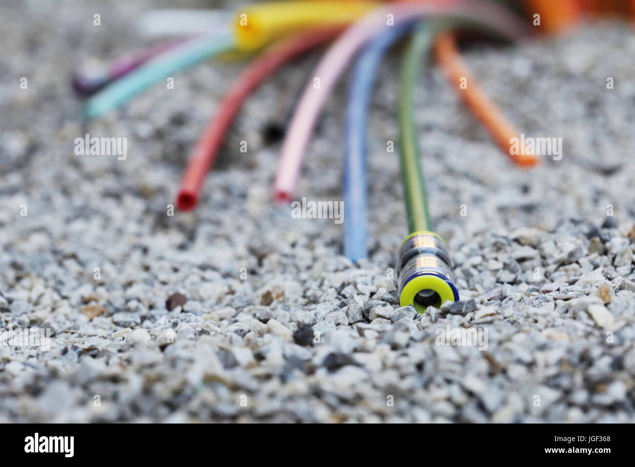 Some Cable at a fiber optic broadband construction site Stock Photo - Alamy