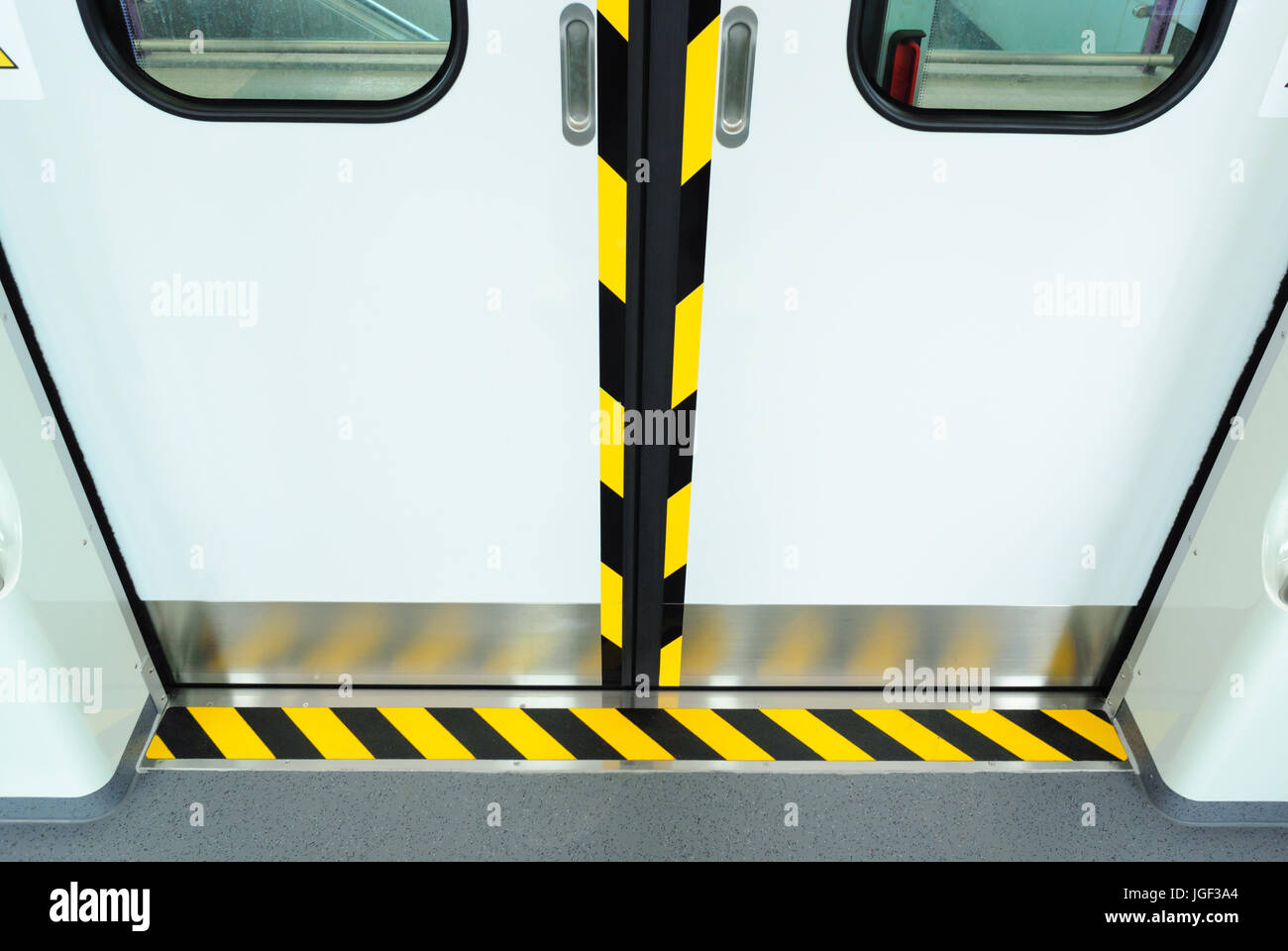 The image shows the door in Metro. Metro doors closed Stock Photo - Alamy