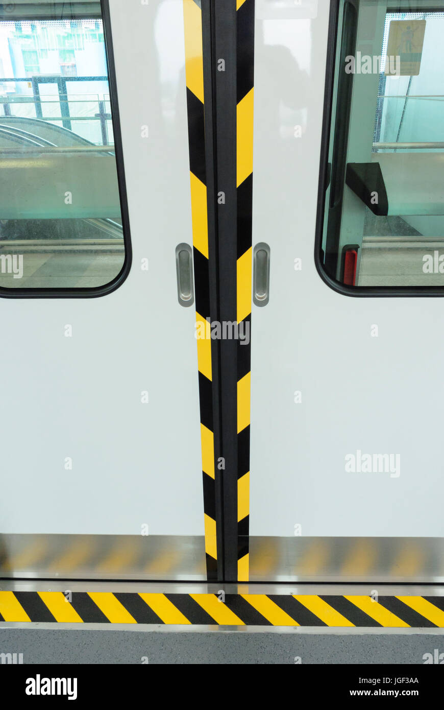 The image shows the door in Metro. Metro doors closed Stock Photo - Alamy