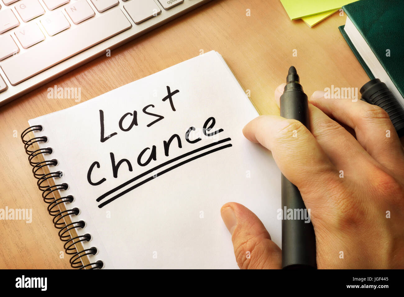 Notepad with handwriting title Last chance Stock Photo - Alamy