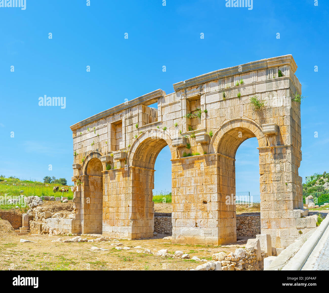 The Triumphal Arch of Metius Modestus welcomes visitors at the entrance ...