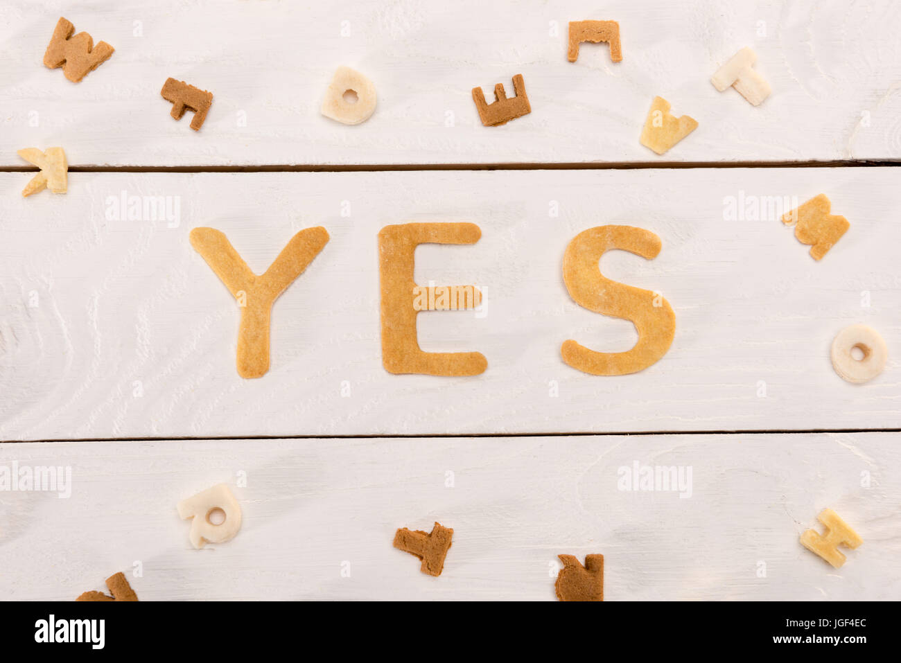 Top view of word yes from breakfast cereal letters and alphabet corn ...