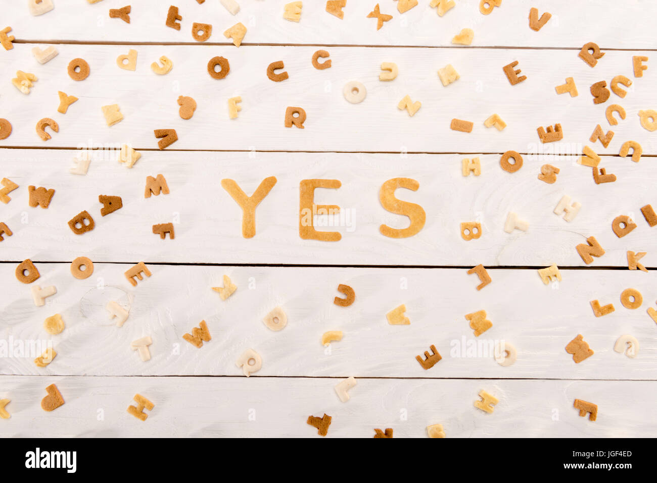 Top view of word yes from breakfast cereal letters and alphabet corn ...
