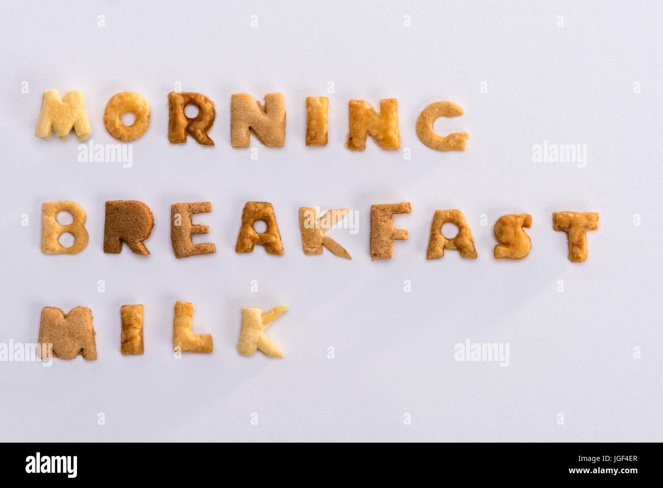 Close-up view of words morning, breakfast, milk from alphabet corn ...