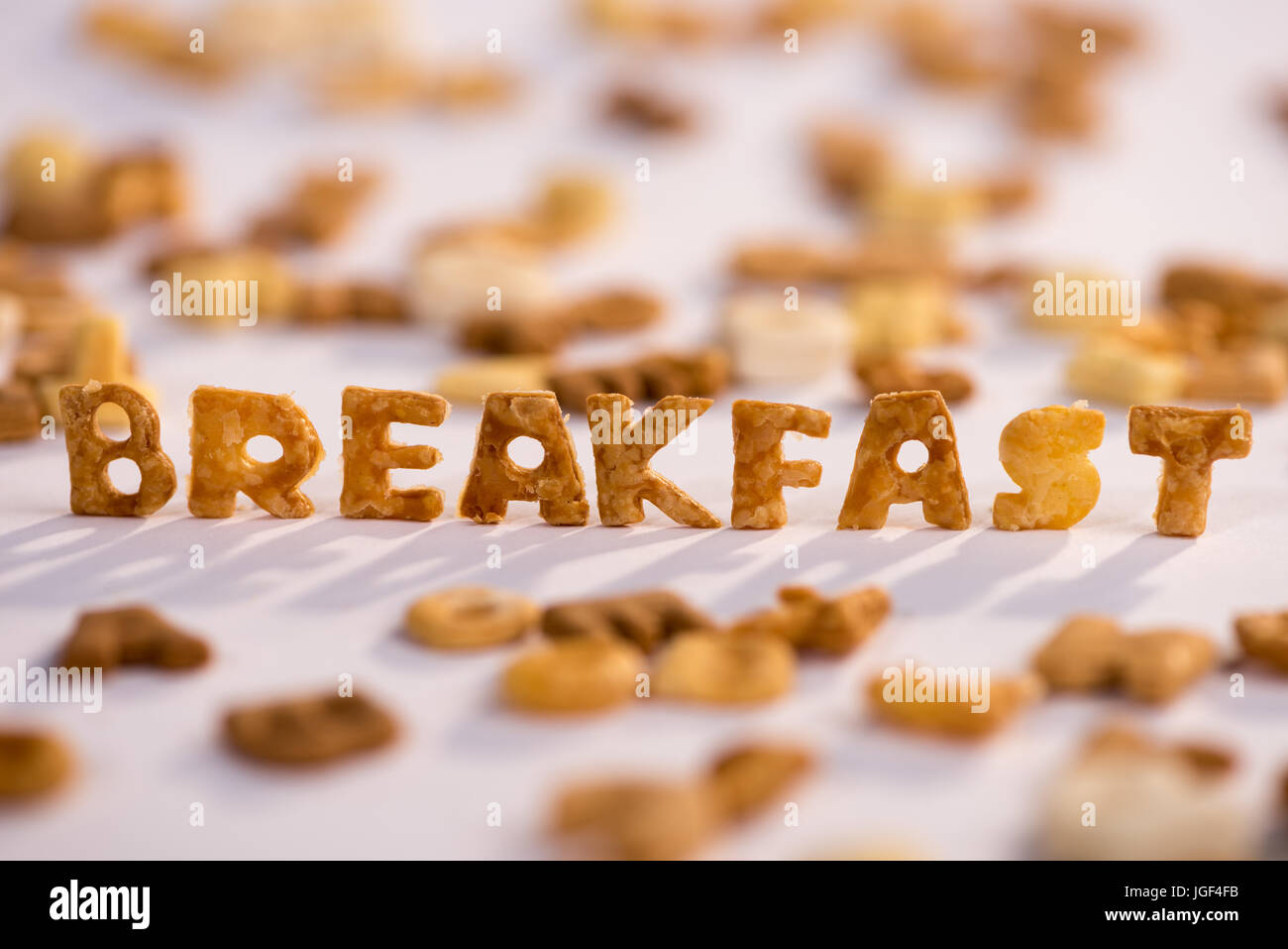 Close-up view of word breakfast and healthy breakfast cereal alphabet ...