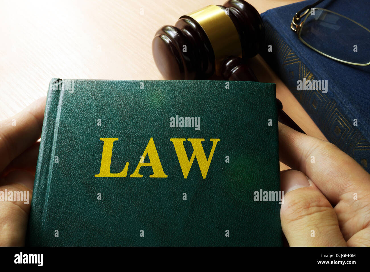 Book with title law and gavel. Litigation concept Stock Photo - Alamy