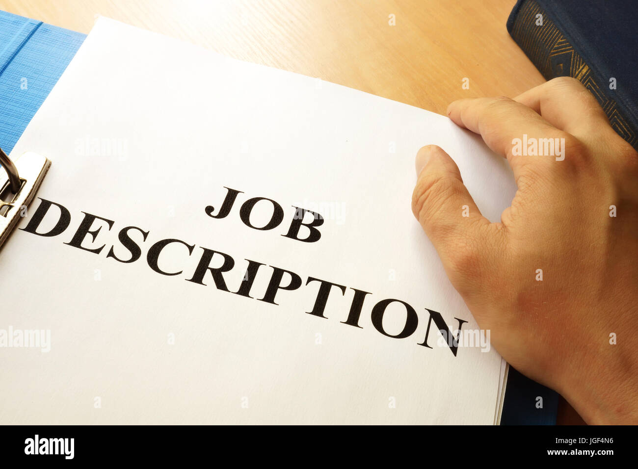 Folder with title Job Descriptions Stock Photo - Alamy