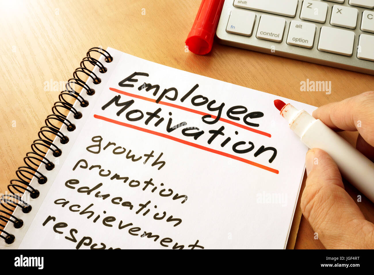 Employee motivation written in a note Stock Photo - Alamy